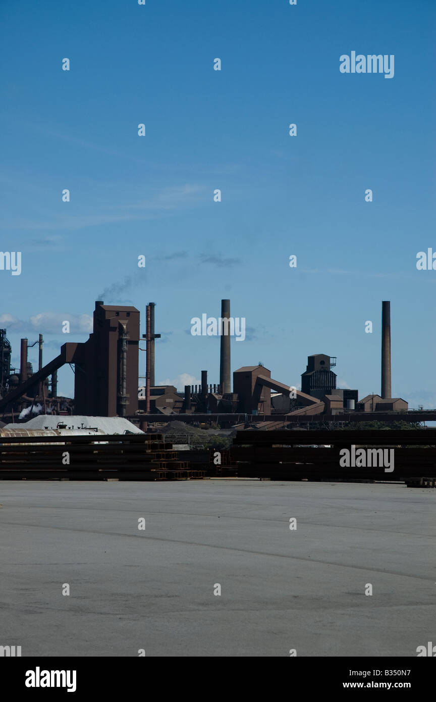 Vertical of steel mill under clear blue sky, Hamilton, Ontario, Canada ...