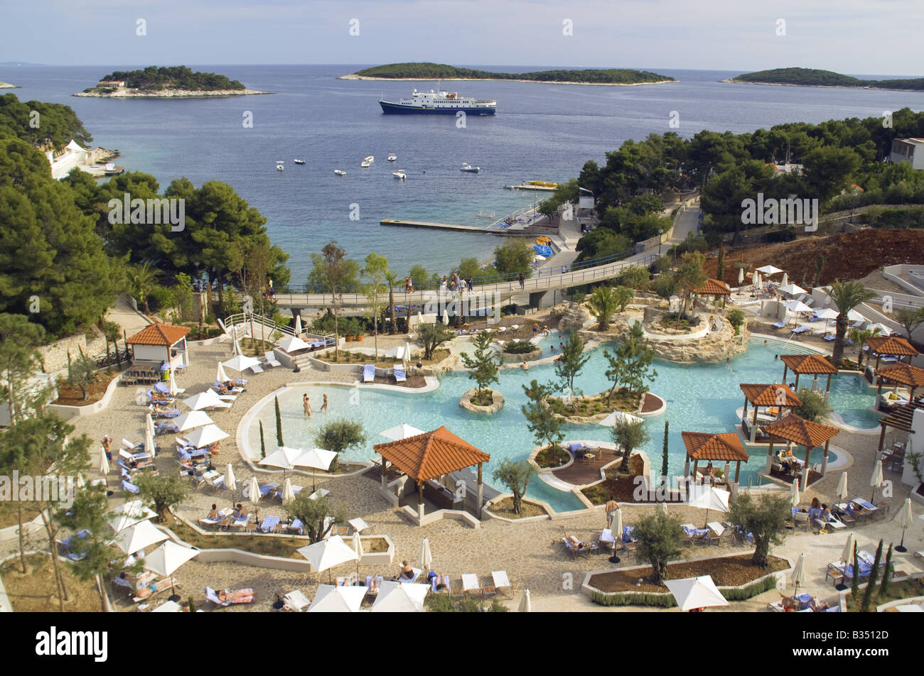 Amfora Hvar Grand Beach Resort, hotel pool area overlooking offshore ...