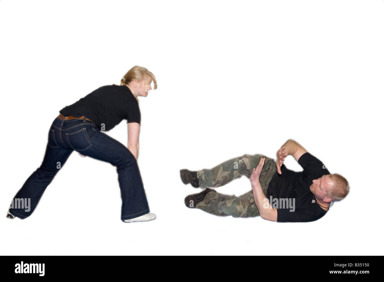 woman and man fighting - showing techniques of self defense Stock Photo ...