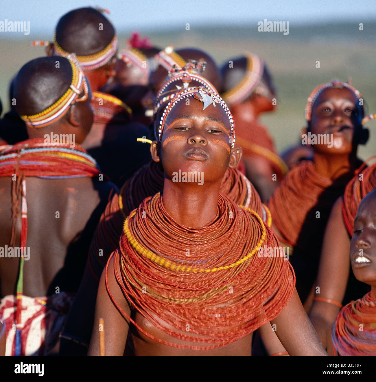 Kenya, Maralal, Lodokejek. Young Samburu girls dance during a wedding ...
