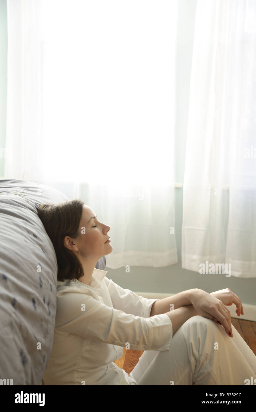 woman resting in bedroom Stock Photo - Alamy