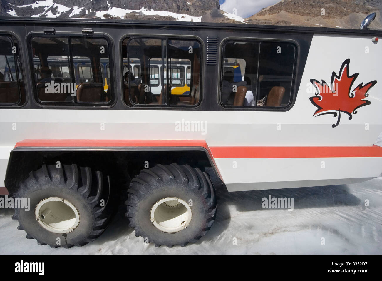 side view of a large snowmobile - columbia icefield, jasper national ...