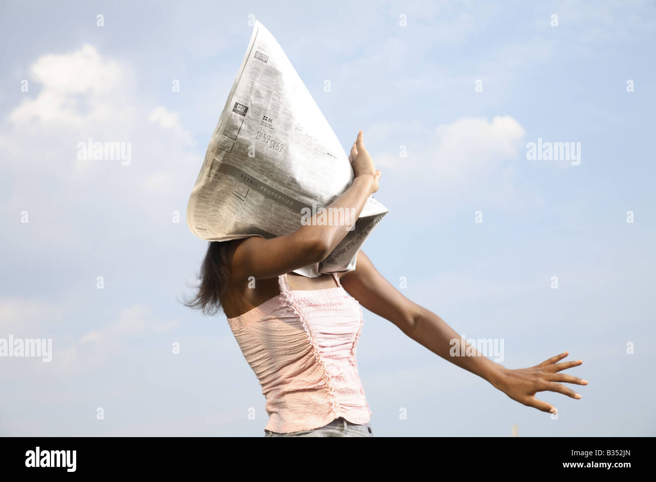 woman with newspaper on face Stock Photo - Alamy