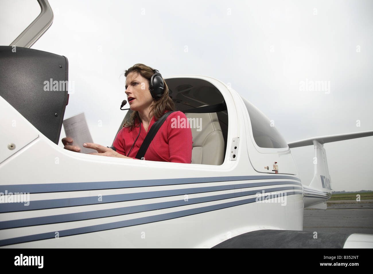 woman with airplane Stock Photo - Alamy
