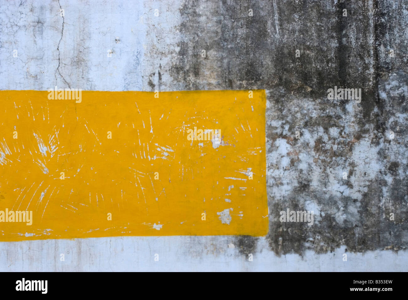 surface view of a yellow rectangle on a rough wall Pushkar India Stock ...