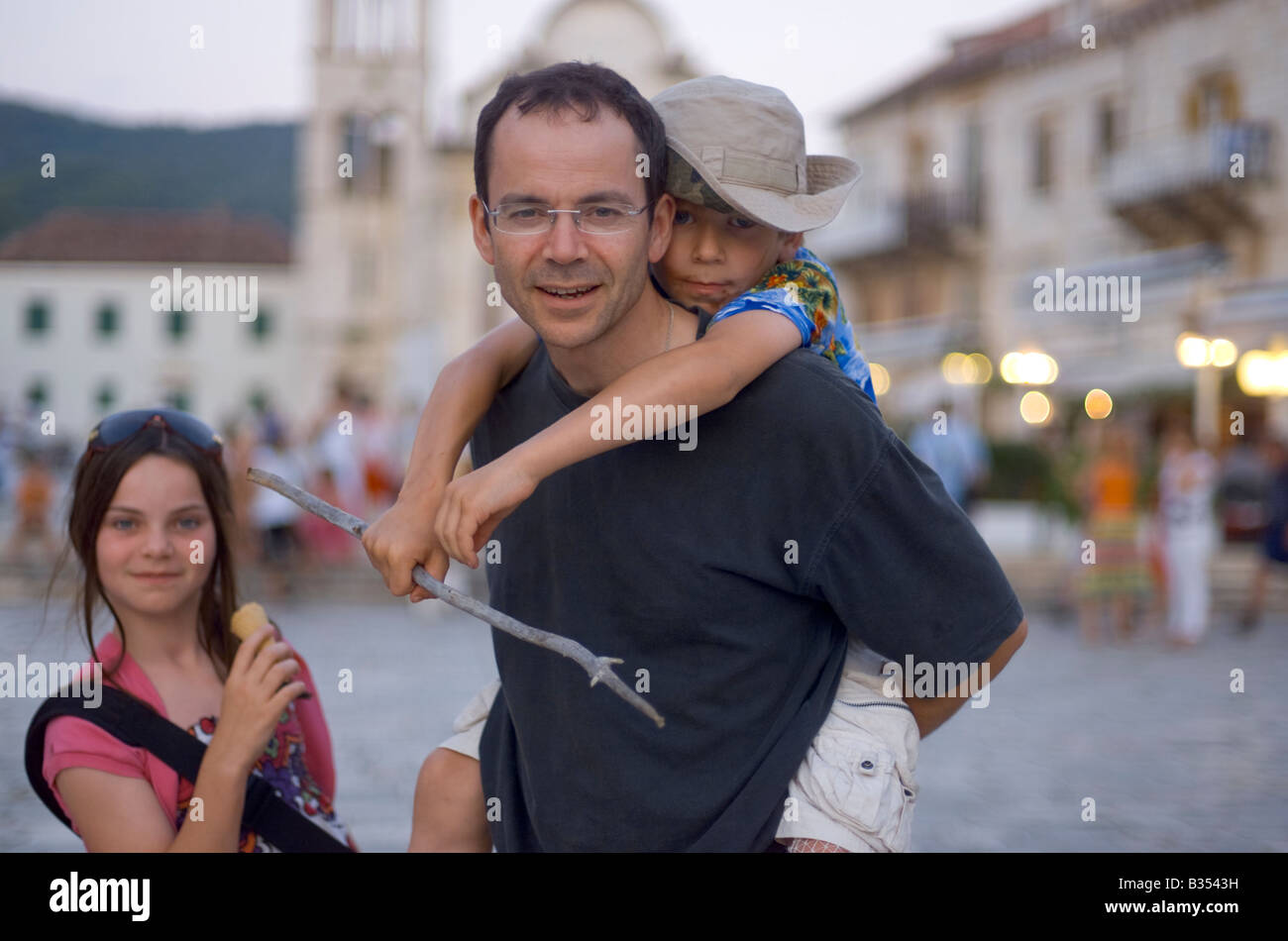 English father and two children on holiday in Hvar Croatia Stock Photo ...