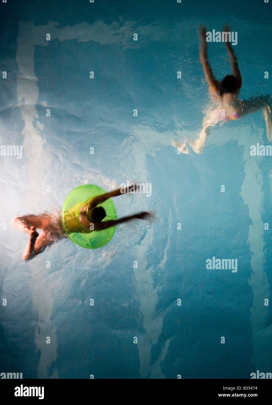 Tourists in pool at night Turkey Stock Photo - Alamy