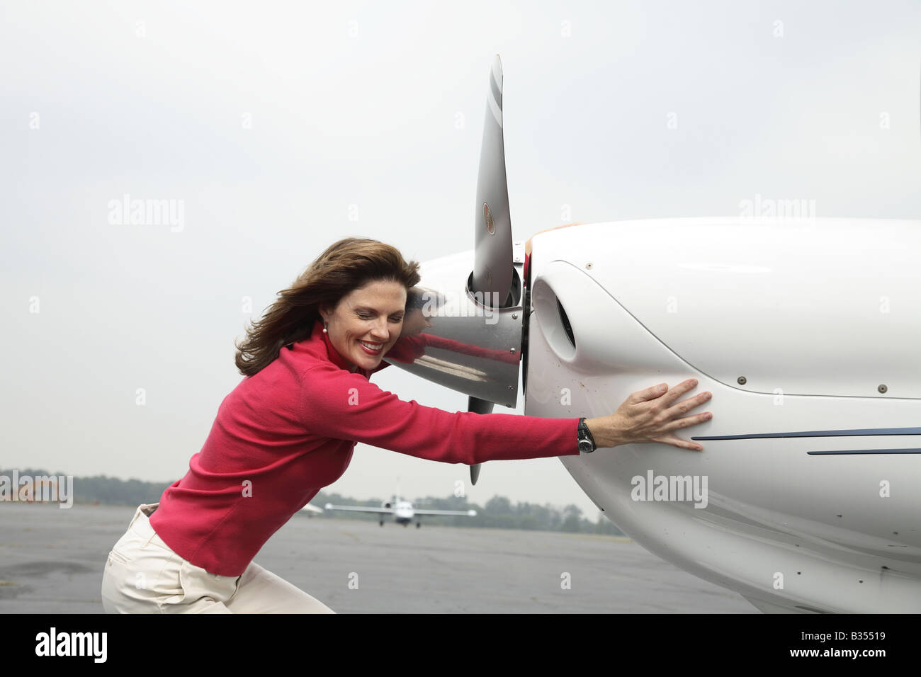 woman with airplane Stock Photo - Alamy