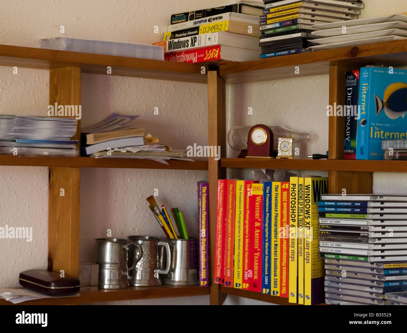 small office shelves books Stock Photo - Alamy