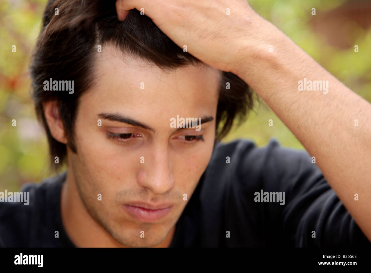Young Man Thinking Model Released Stock Photo - Alamy
