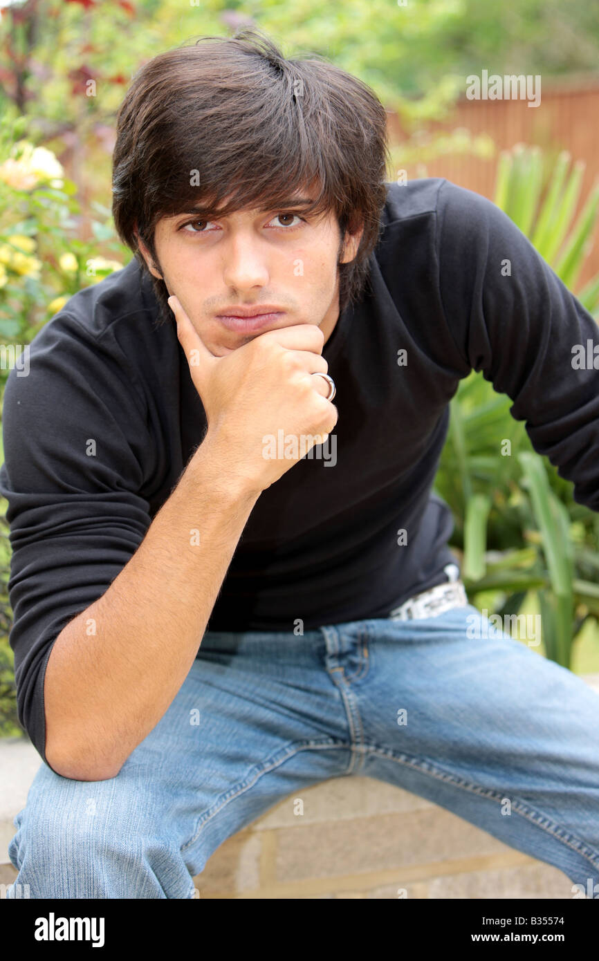 Young Man Thinking Model Released Stock Photo - Alamy