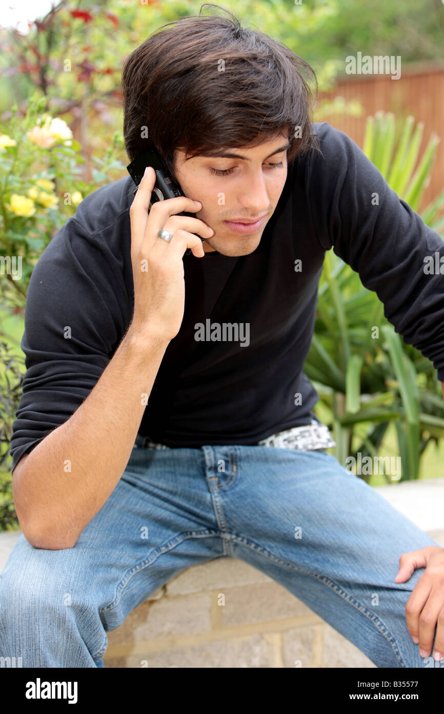 Young Man Using Mobile Phone Model Released Stock Photo - Alamy