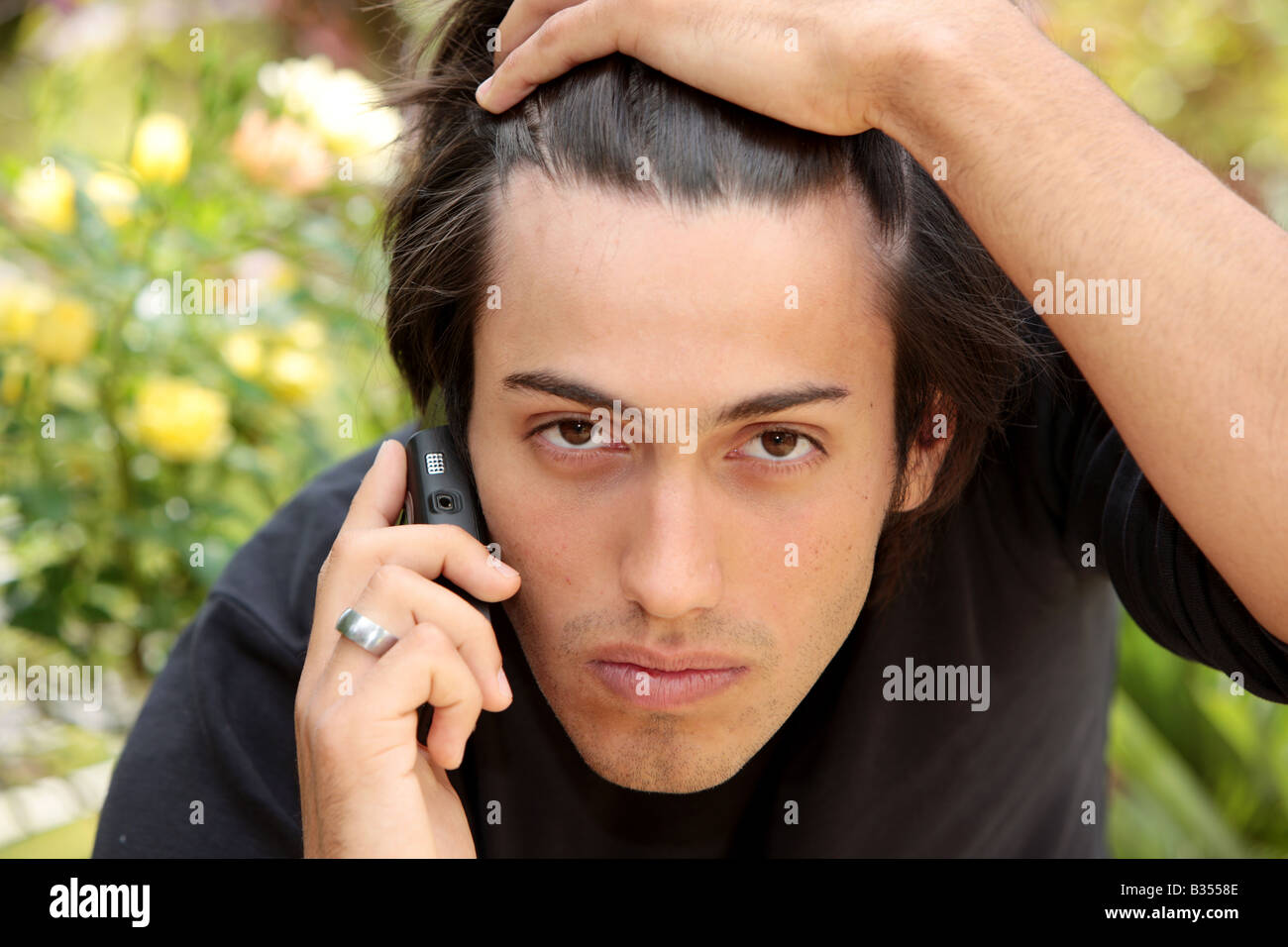 Young Man Using Mobile Phone Model Released Stock Photo - Alamy