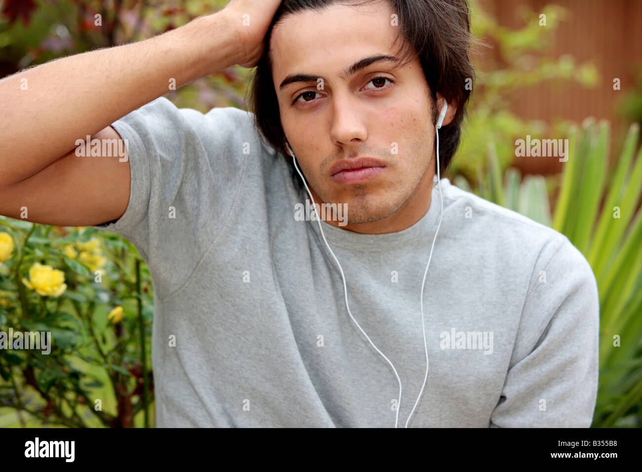 Young Man Listening to Music Model Released Stock Photo - Alamy