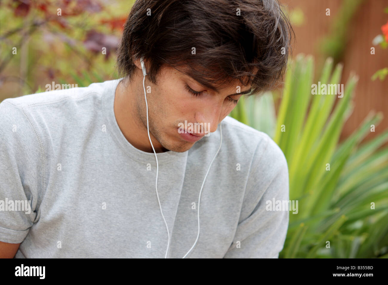 Young Man Listening to Music Model Released Stock Photo - Alamy