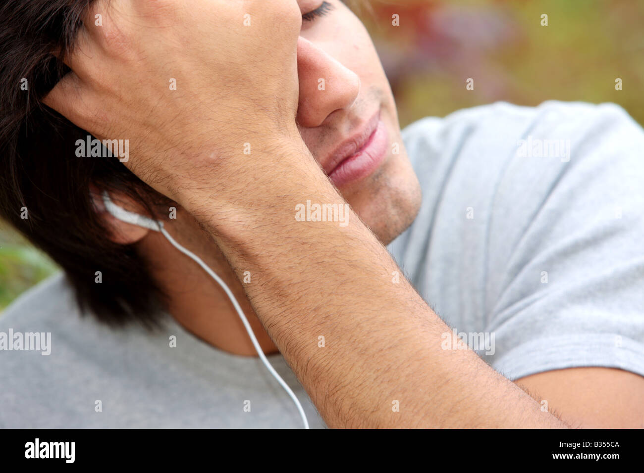 Young Man Listening to Music Model Released Stock Photo - Alamy