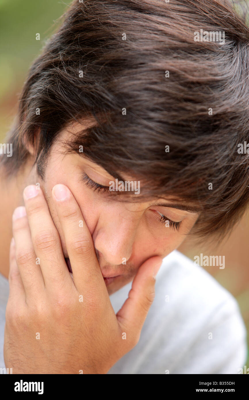 Young Man Thinking Model Released Stock Photo - Alamy