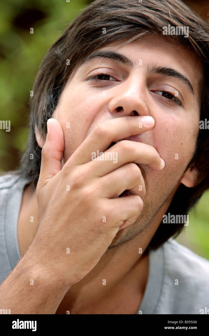 Young Man Yawning Model Released Stock Photo - Alamy