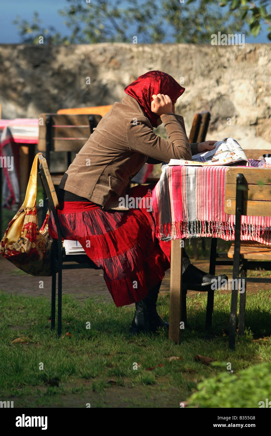 Turkish woman reading a newspaper, Trabzon, Turkey Stock Photo - Alamy