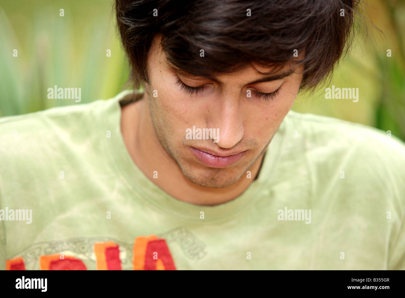 Young Man Thinking Model Released Stock Photo - Alamy