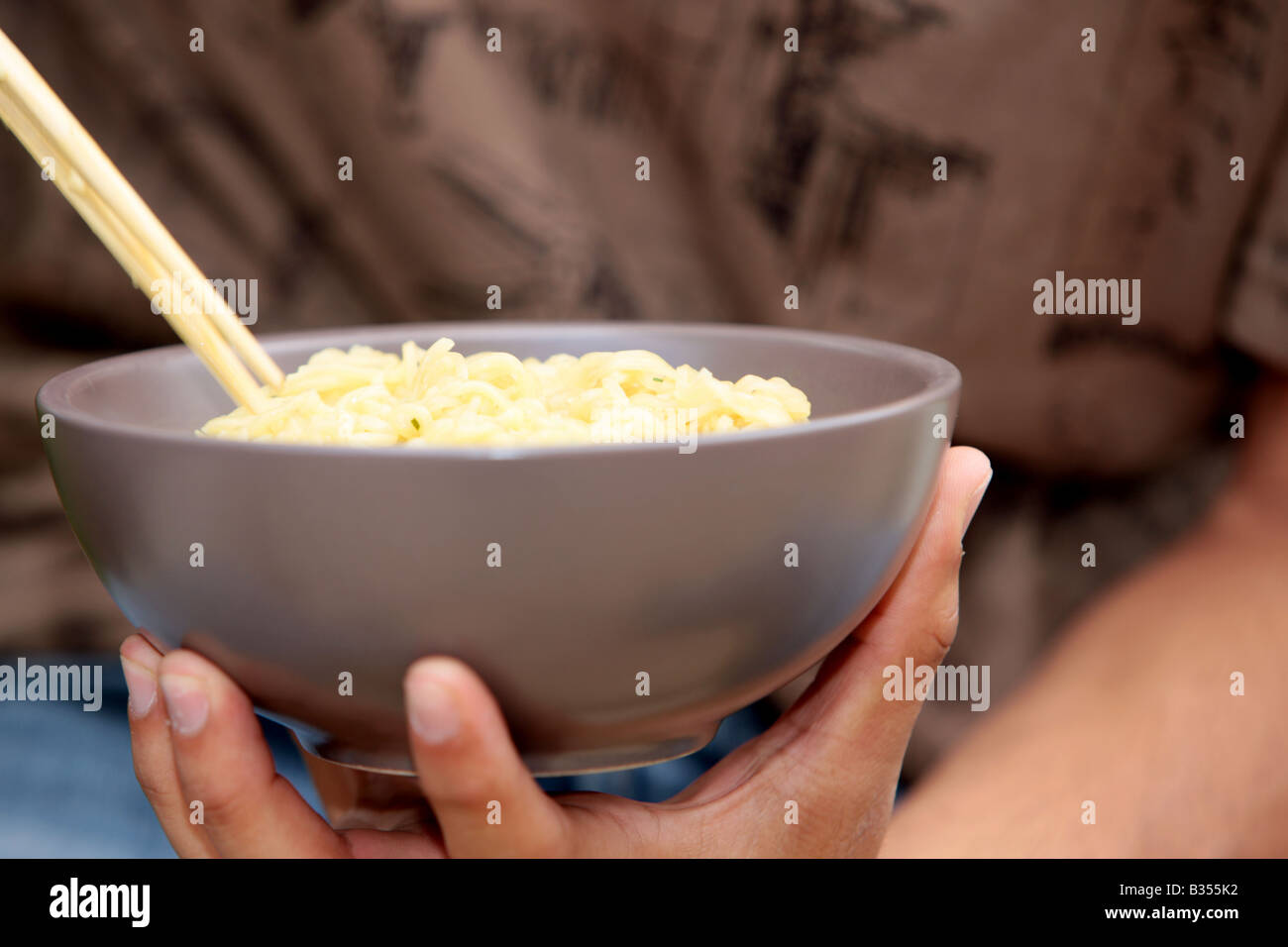 Young Man Eating Model Released Stock Photo - Alamy