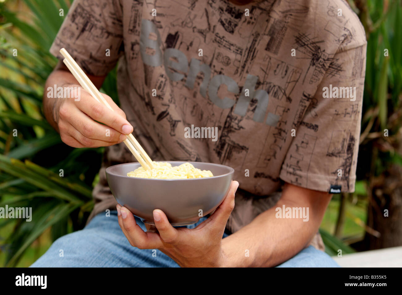 Young Man Eating Model Released Stock Photo - Alamy