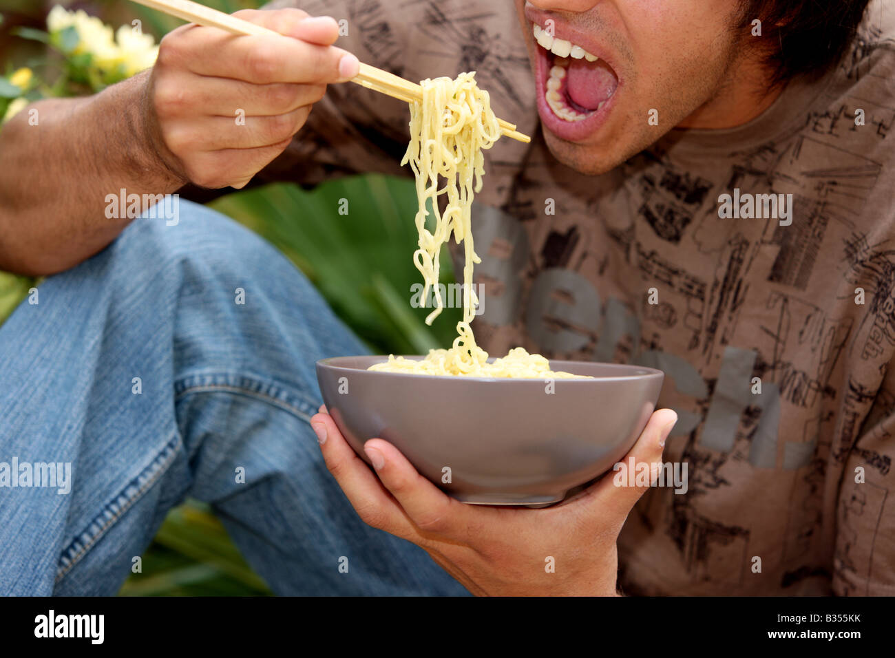 Young Man Eating Model Released Stock Photo - Alamy