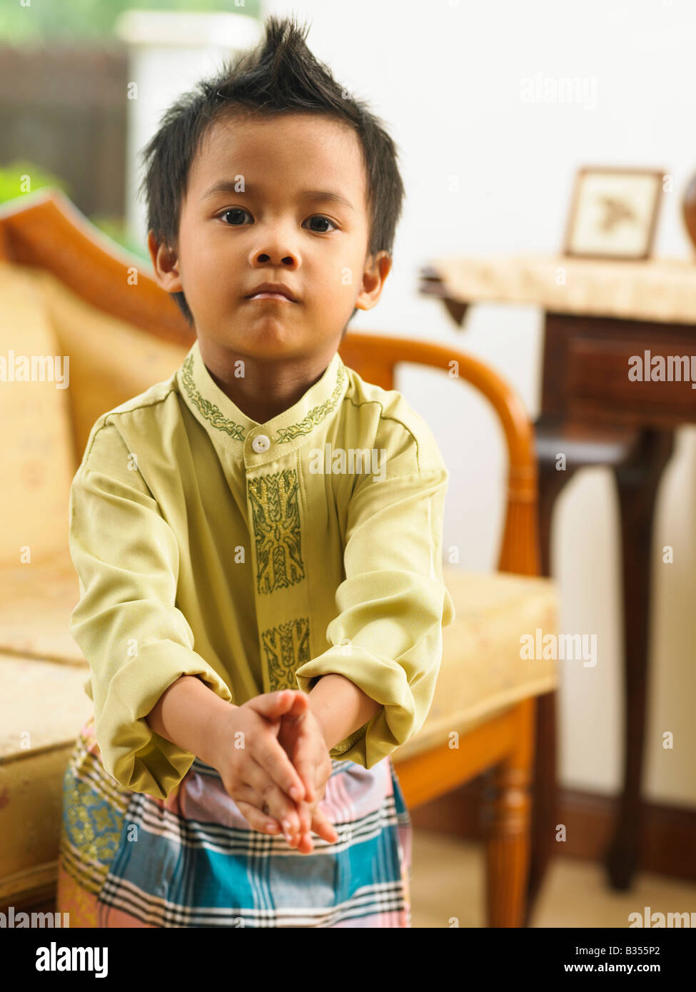 A young boy with hands out Stock Photo - Alamy