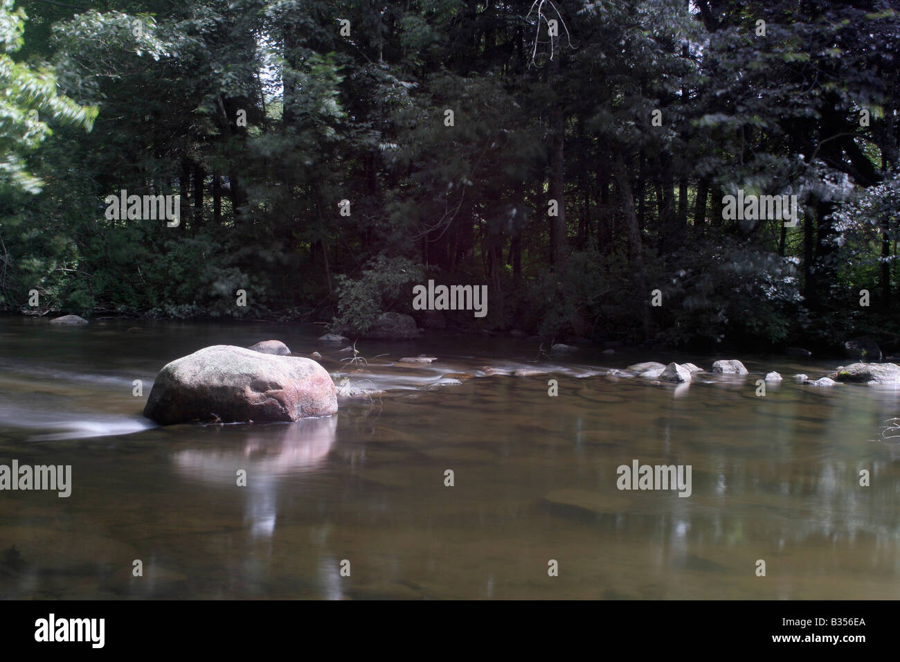 Stones in stream Brainard's Bridge park Waupaca Wisconsin Stock Photo ...