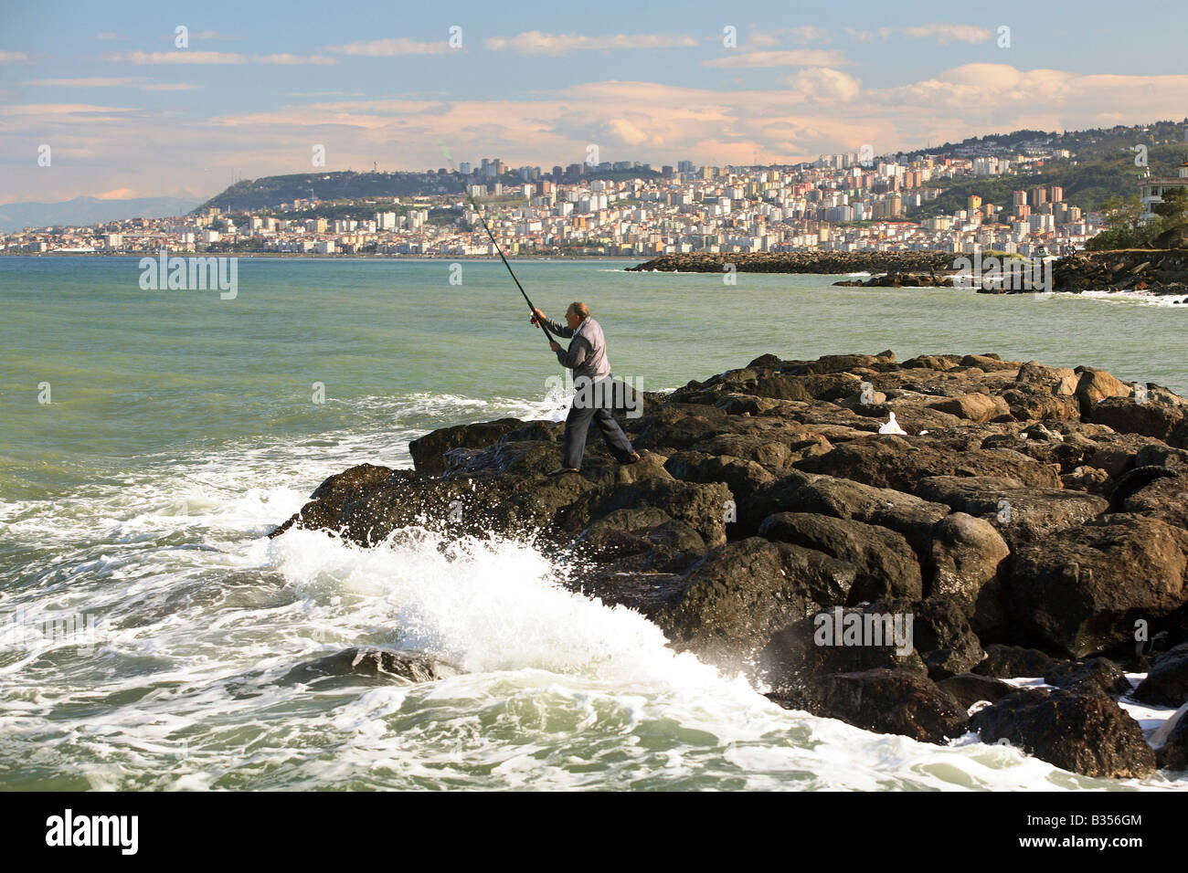 Man fishing at the Black Sea coast, Trabzon, Turkey Stock Photo - Alamy