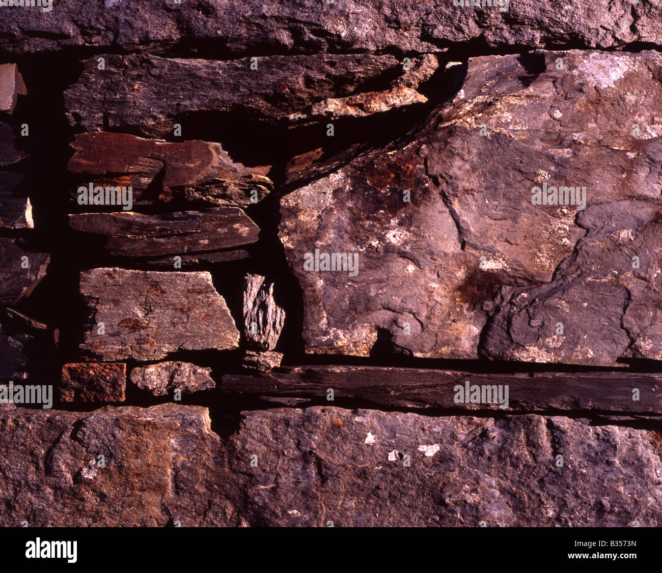 Slate wall, derelict Quarry at the foot of Moel Siabod, Snowdonia ...