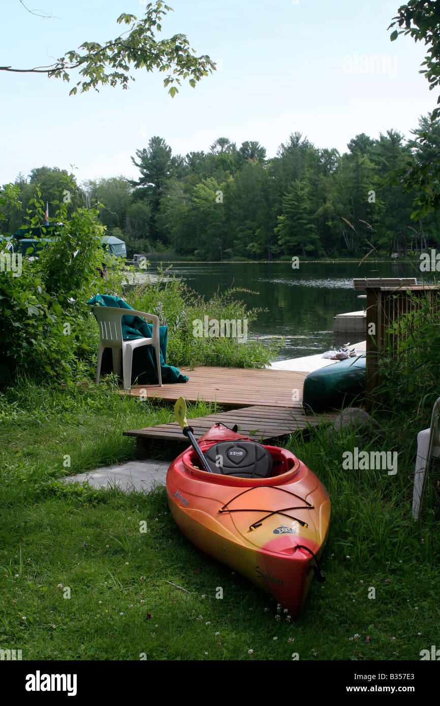 kayak on northern Wisconsin lakeshore Stock Photo - Alamy