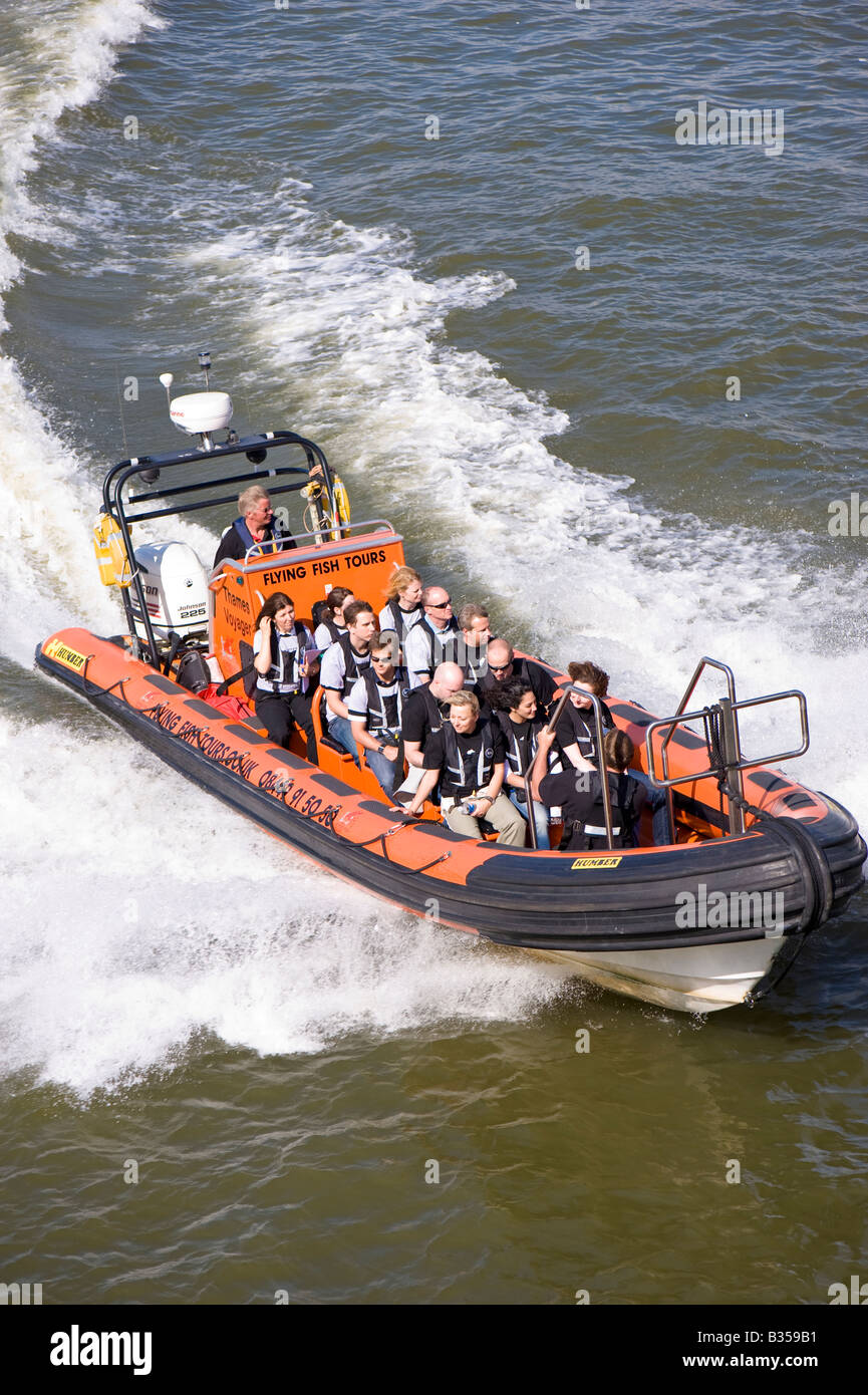 Tourists in speed boat ride on Thames River London United Kingdom Stock ...