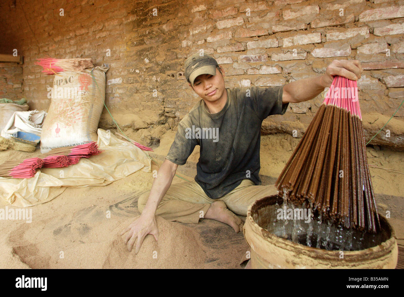 Man producing incense sticks, Hanoi, Vietnam Stock Photo - Alamy