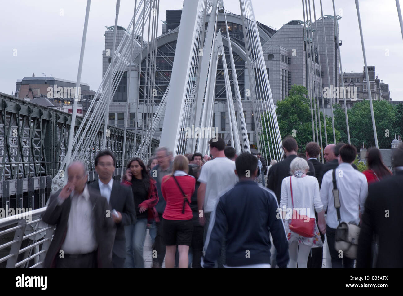 With pedestrians crossing the bridge hi-res stock photography and ...