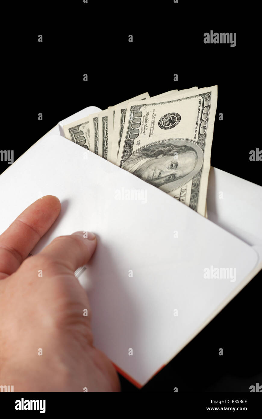 Bribe Criminal activity payoff Money enclosed in an envelope Stock ...