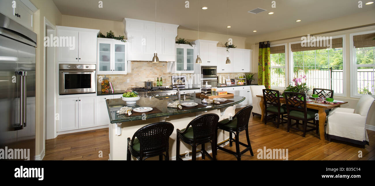 Interior of a contemporary dining room and kitchen Stock Photo - Alamy