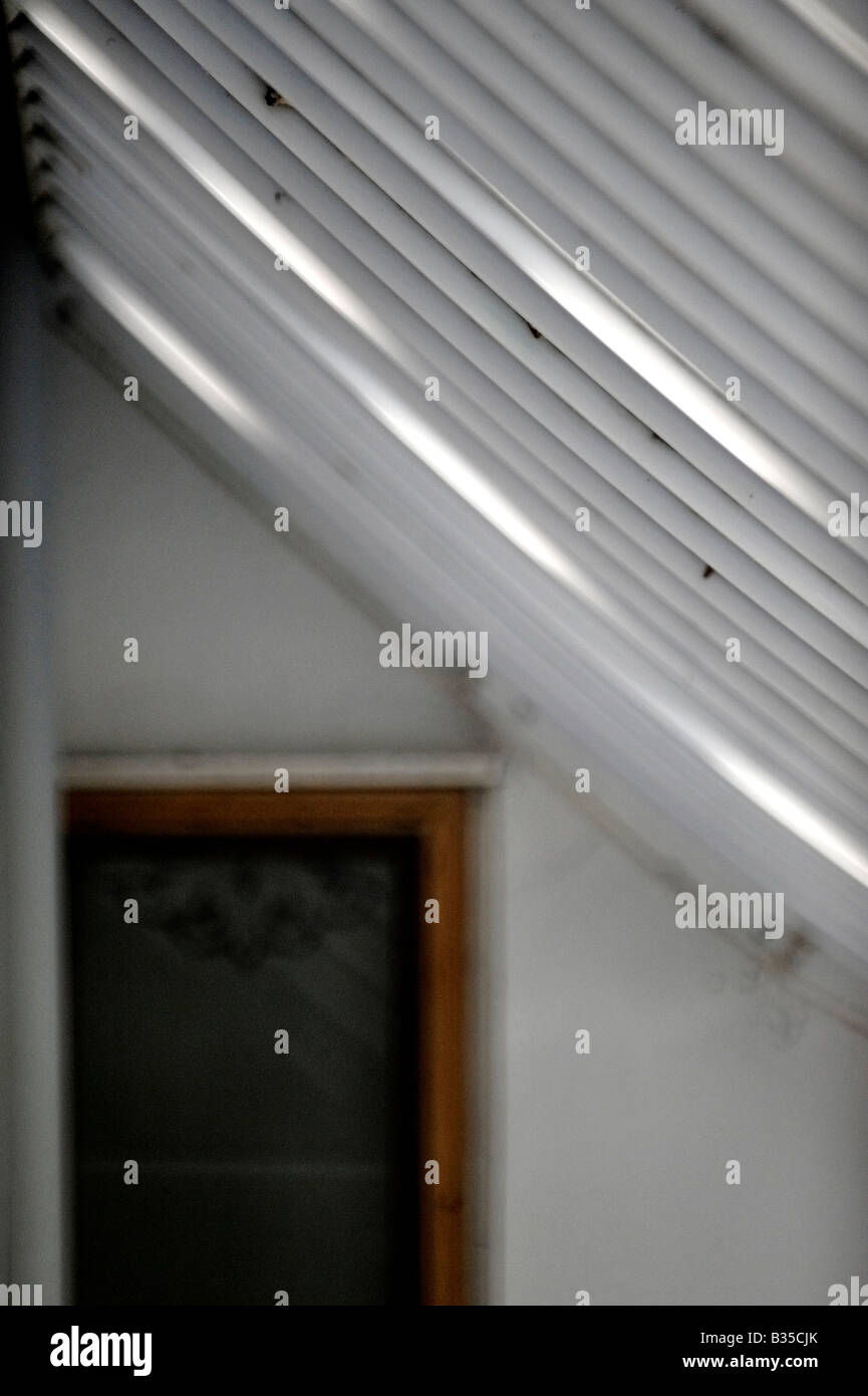 window underneath sloping roof Stock Photo - Alamy