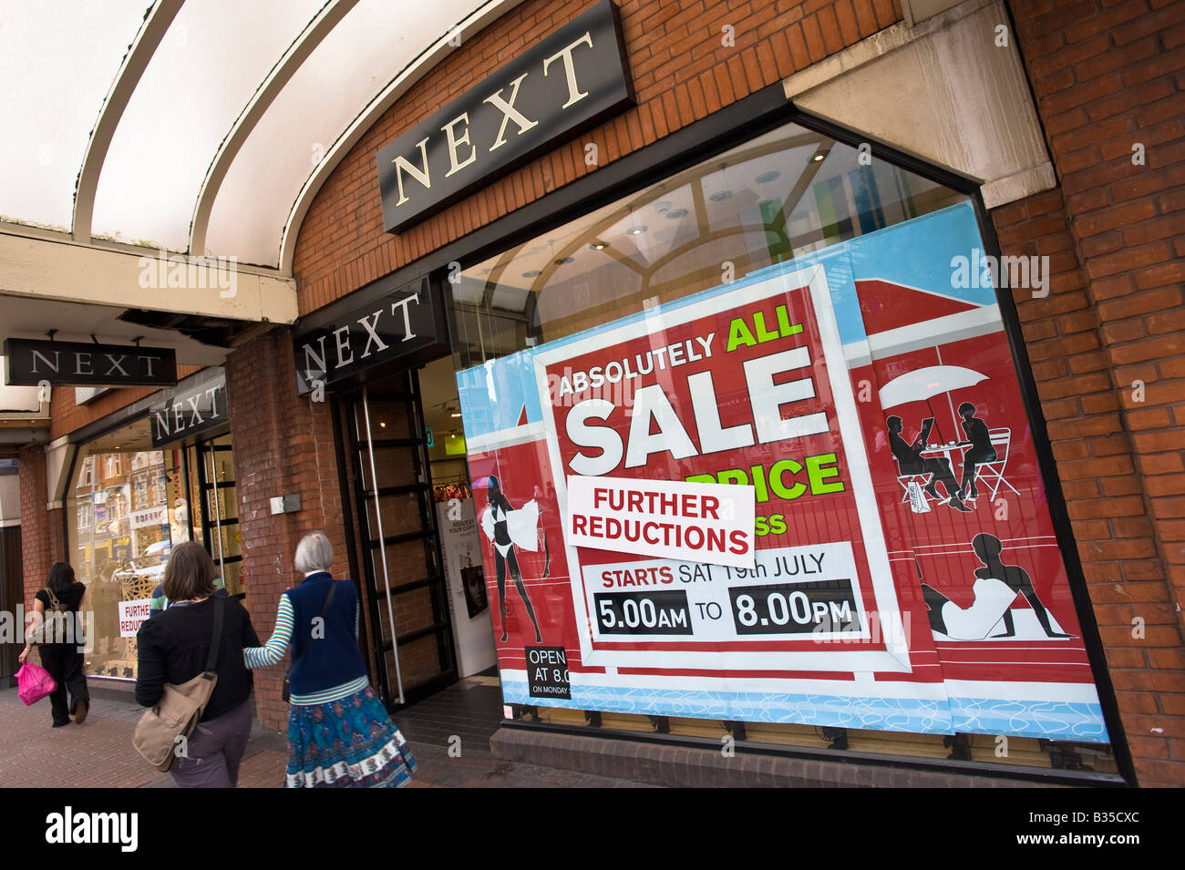 Sale sign in shop window of NEXT shop, London, United Kingdom Stock ...