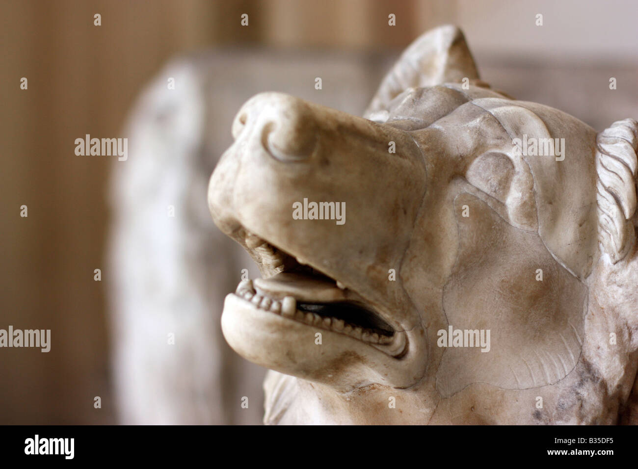 Ancient dog sculpture Stock Photo - Alamy
