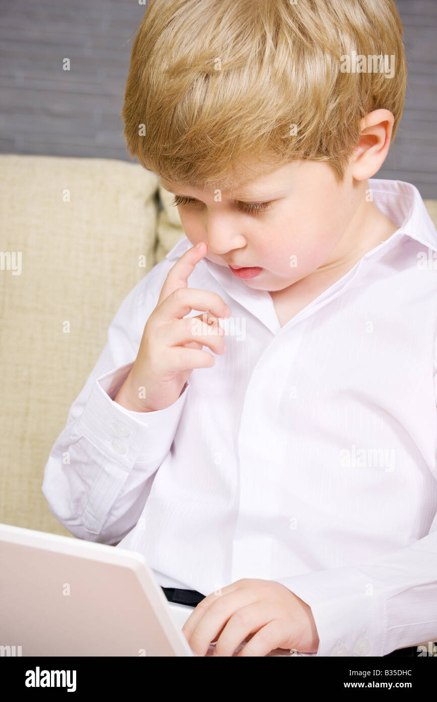 picture of boy with white laptop computer Stock Photo - Alamy