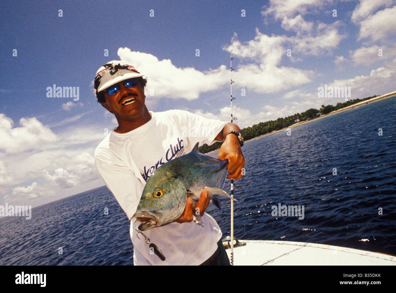 Fisherman with Blue fin Trevally caught off Arno Atoll Marshall Islands ...