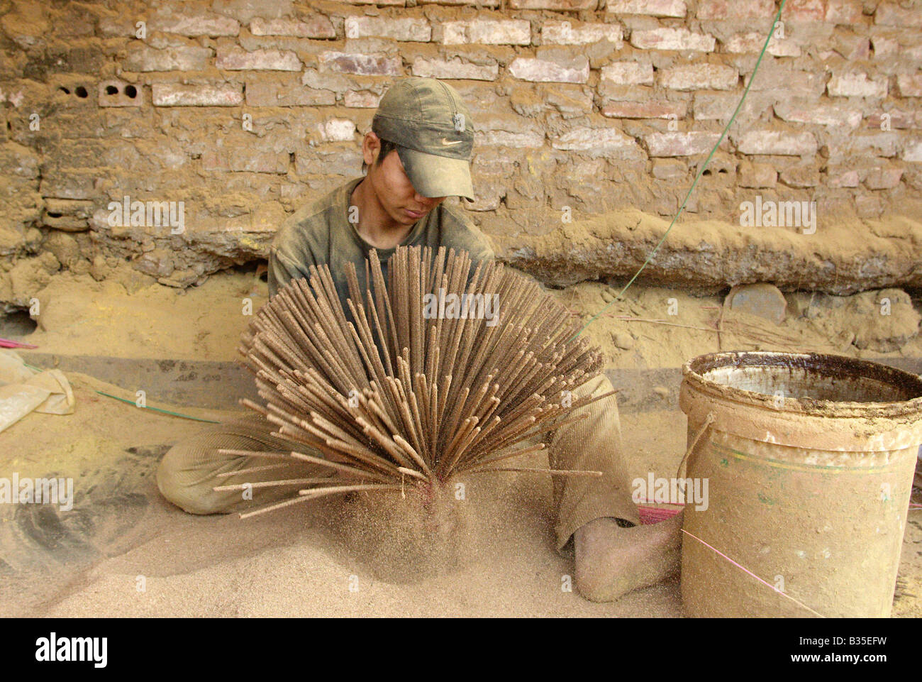Man producing incense sticks, Hanoi, Vietnam Stock Photo - Alamy