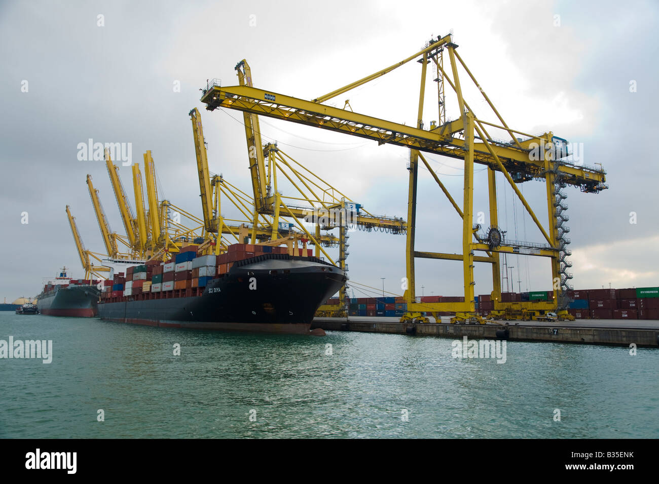 SPAIN Barcelona View from tour boat of large cranes for unloading ...