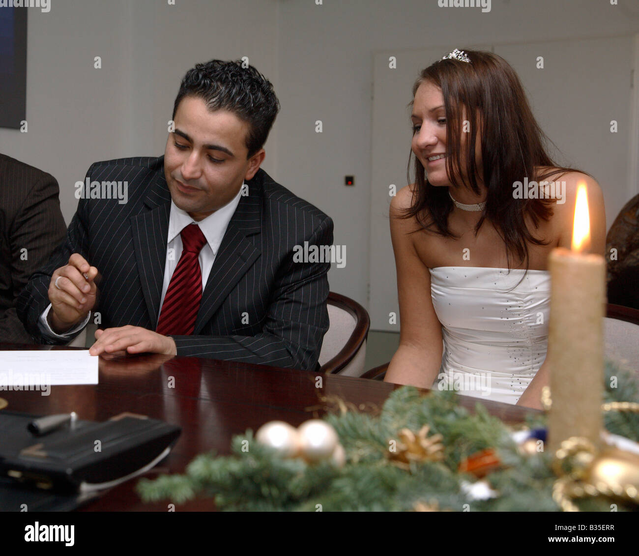 Young bridal couple during their marriage ceremony, Langenfeld, Germany ...