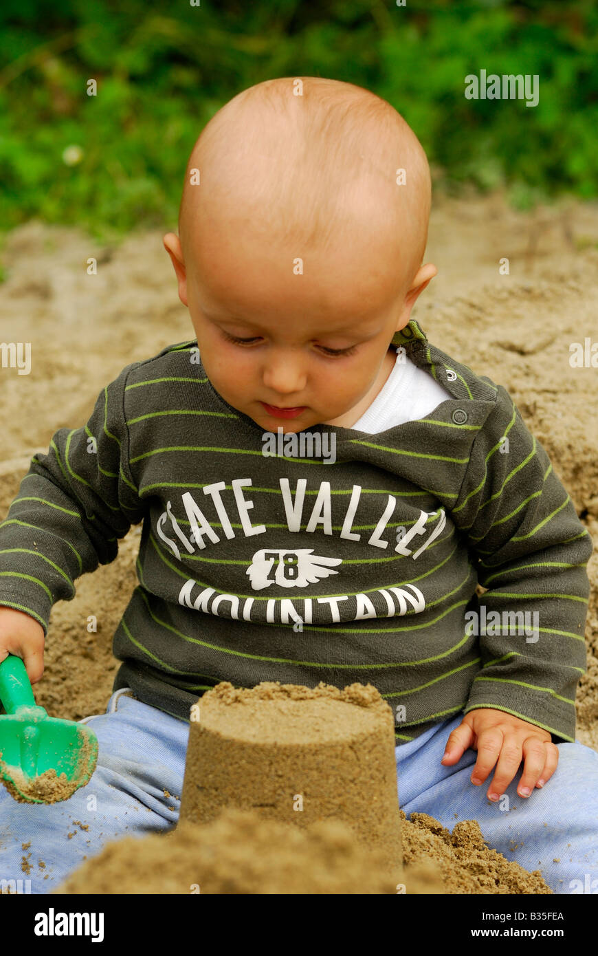 Baby boy boys in sand pit playing toys playground 1 2 years Stock Photo ...