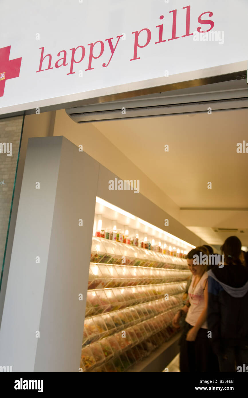 SPAIN Barcelona Customers look at bins in Happy Pills candy store Stock ...