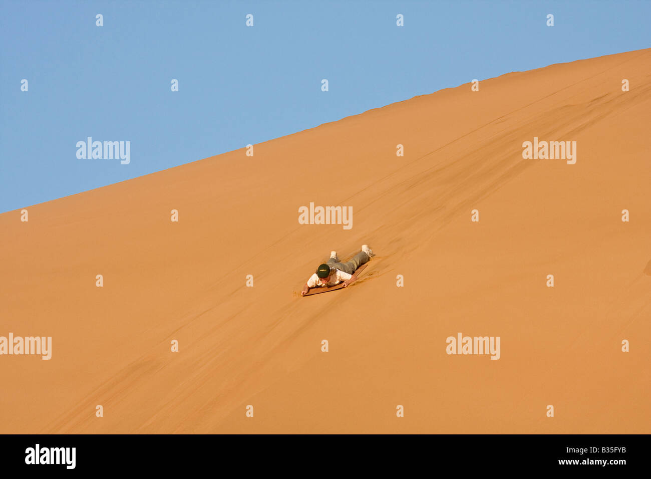 Sliding down dunes hi-res stock photography and images - Alamy