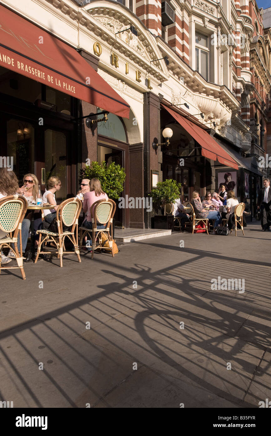 People enjoying drink in ORIEL brasserie on Sloane Square Chelsea SW3 ...
