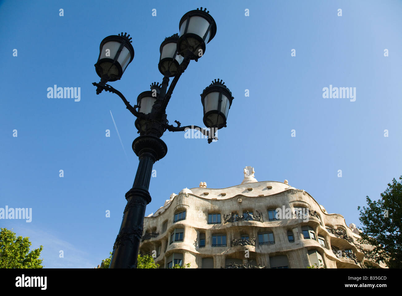 SPAIN Barcelona Lamp post and exterior of Casa Batllo on Block of ...